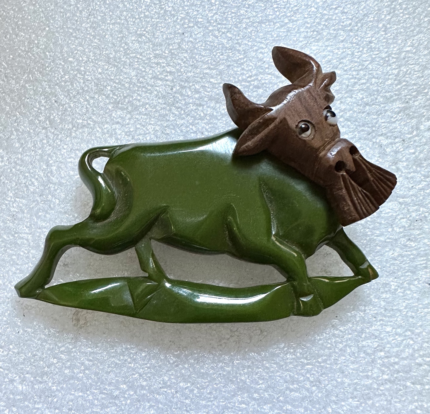 Green Carved Bakelite Bull Pin Articulated Head