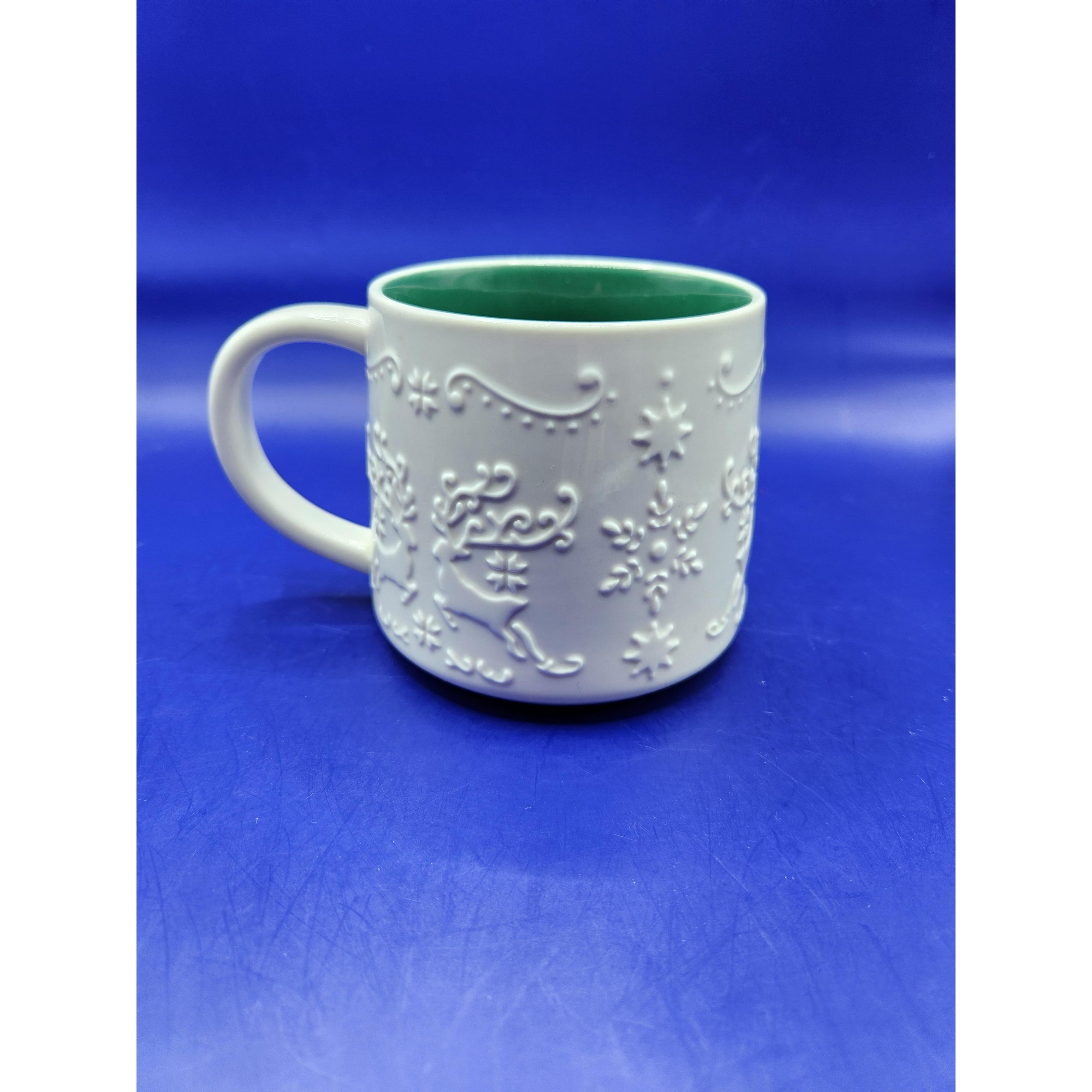 Lindt & Sprungli White Embossed Reindeer and Snowflake Mug