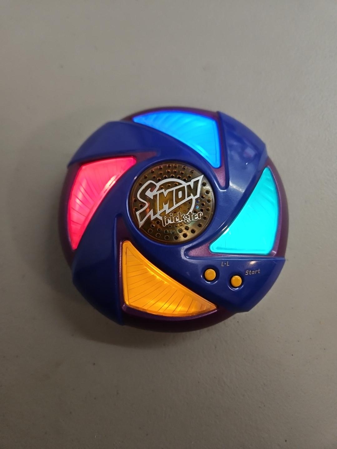 Hasbro Handheld Simon Trickster Works Well Purple Game