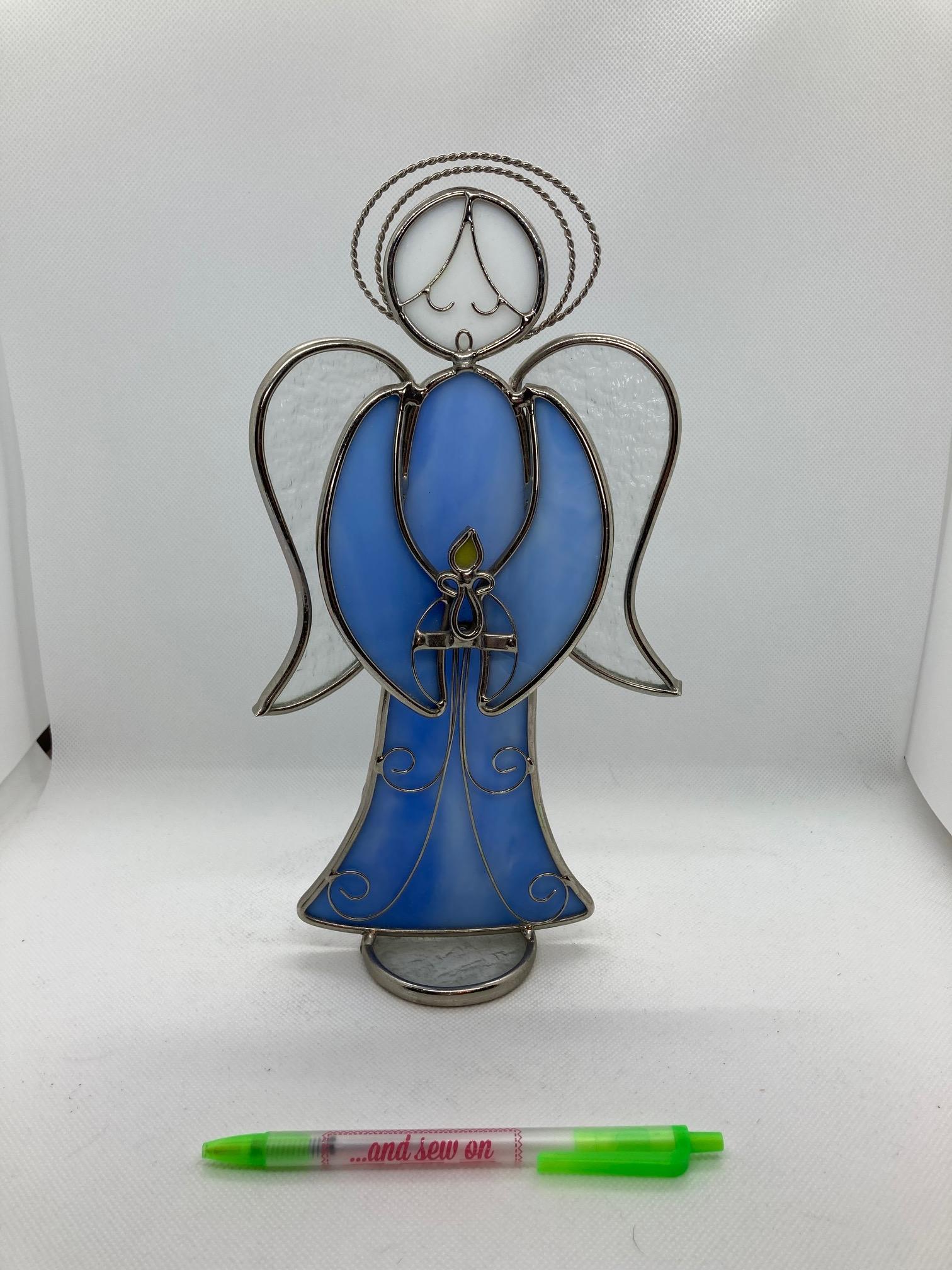 Blue glass angel, cracks