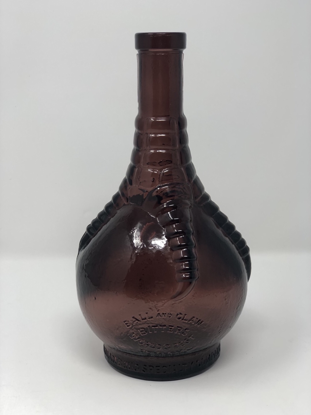 Large Amethyst Wheaton Ball and Claw Bitters Bottle