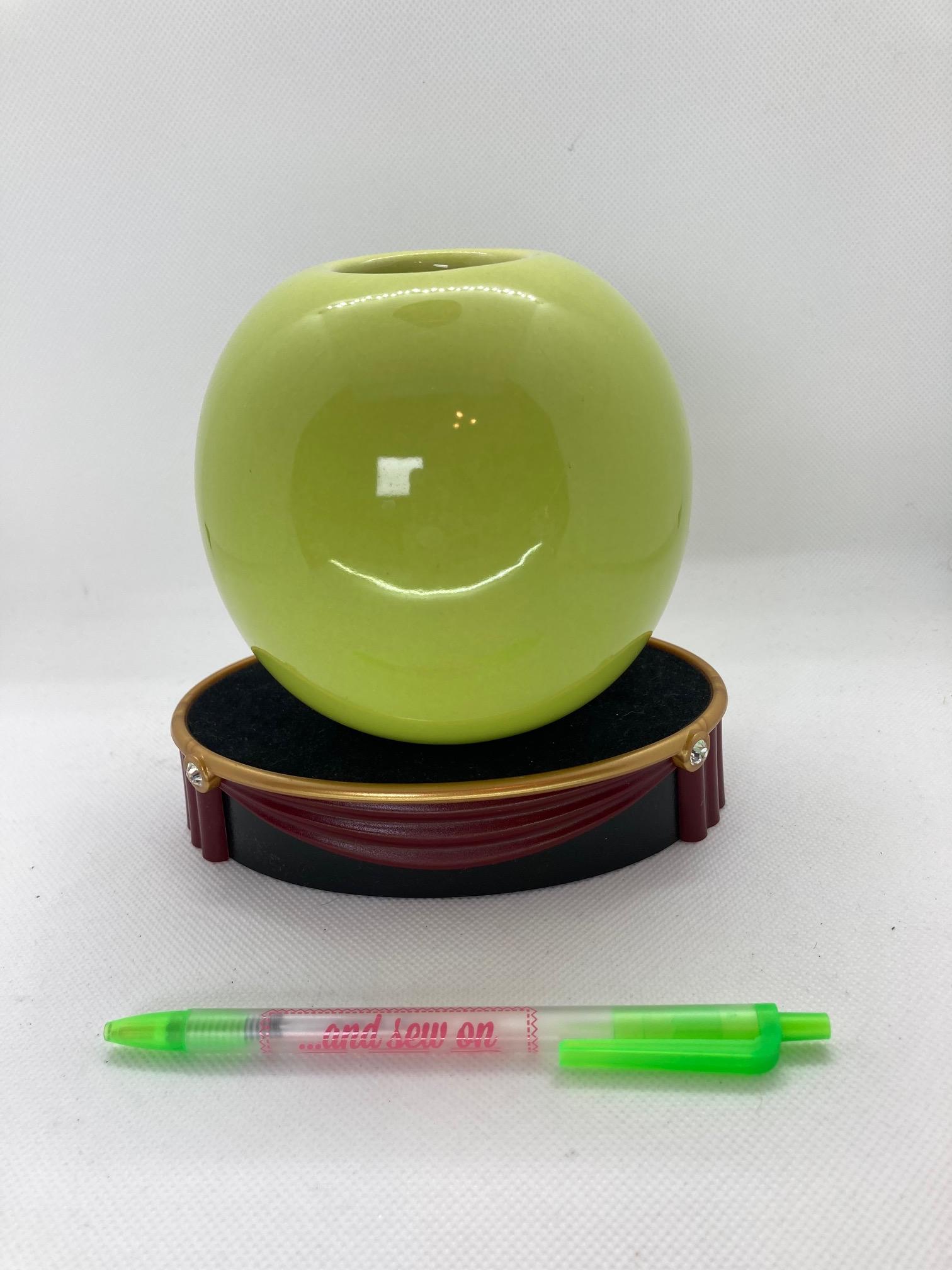 Allen's floral container Green round globe ceramic