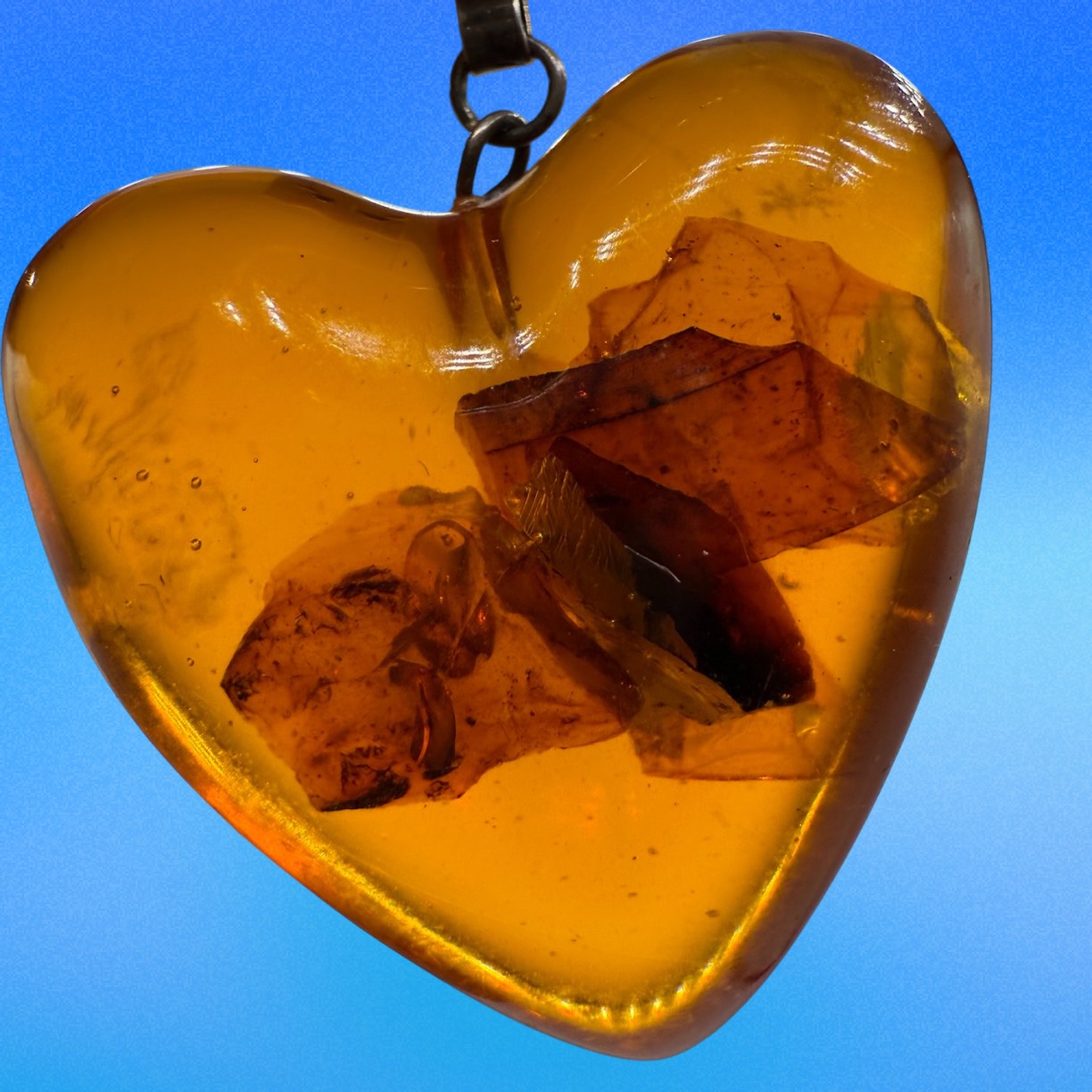 Genuine Amber Puffy Heart On .925 Sterling Bail