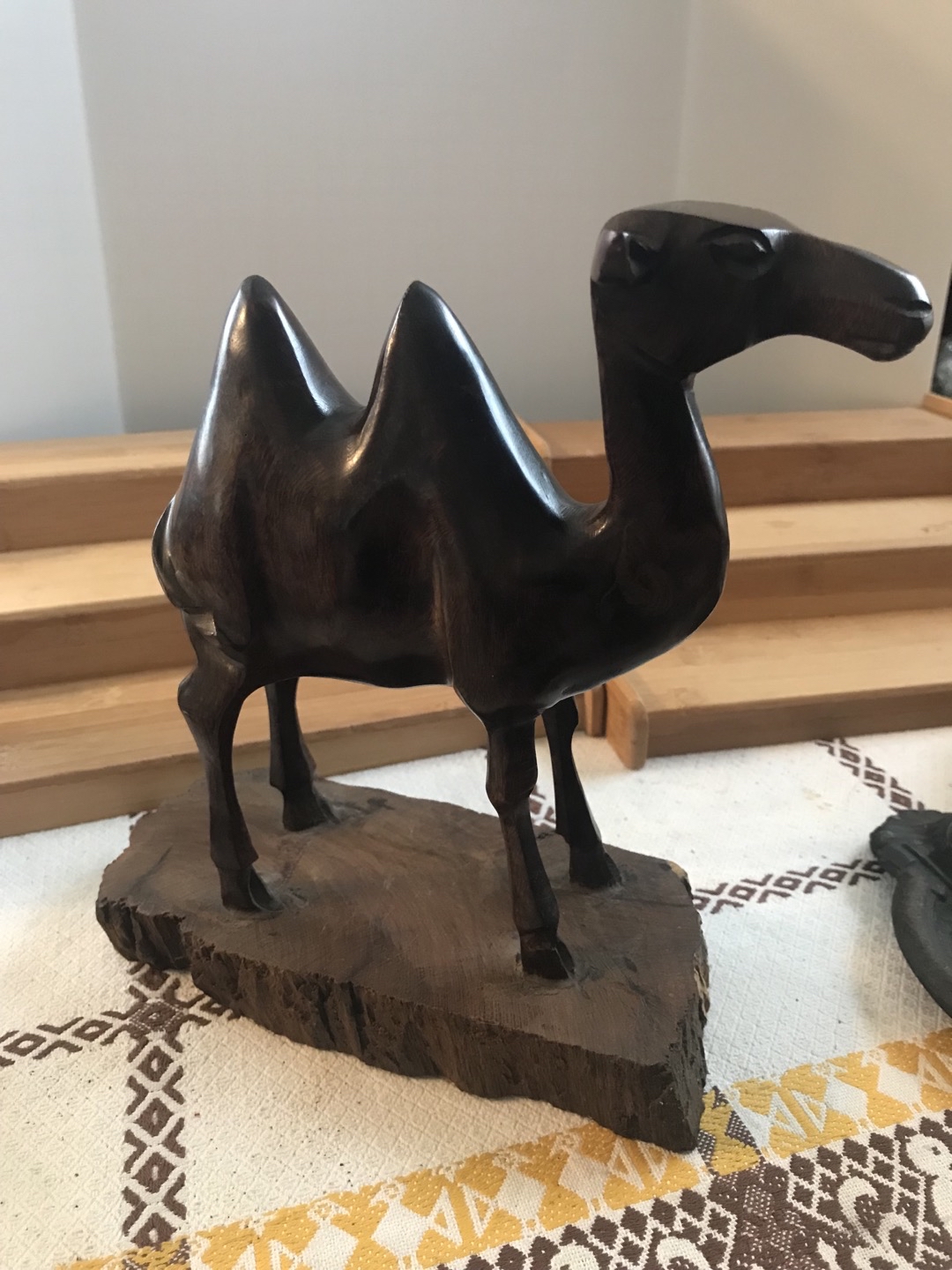 carved wooden camel