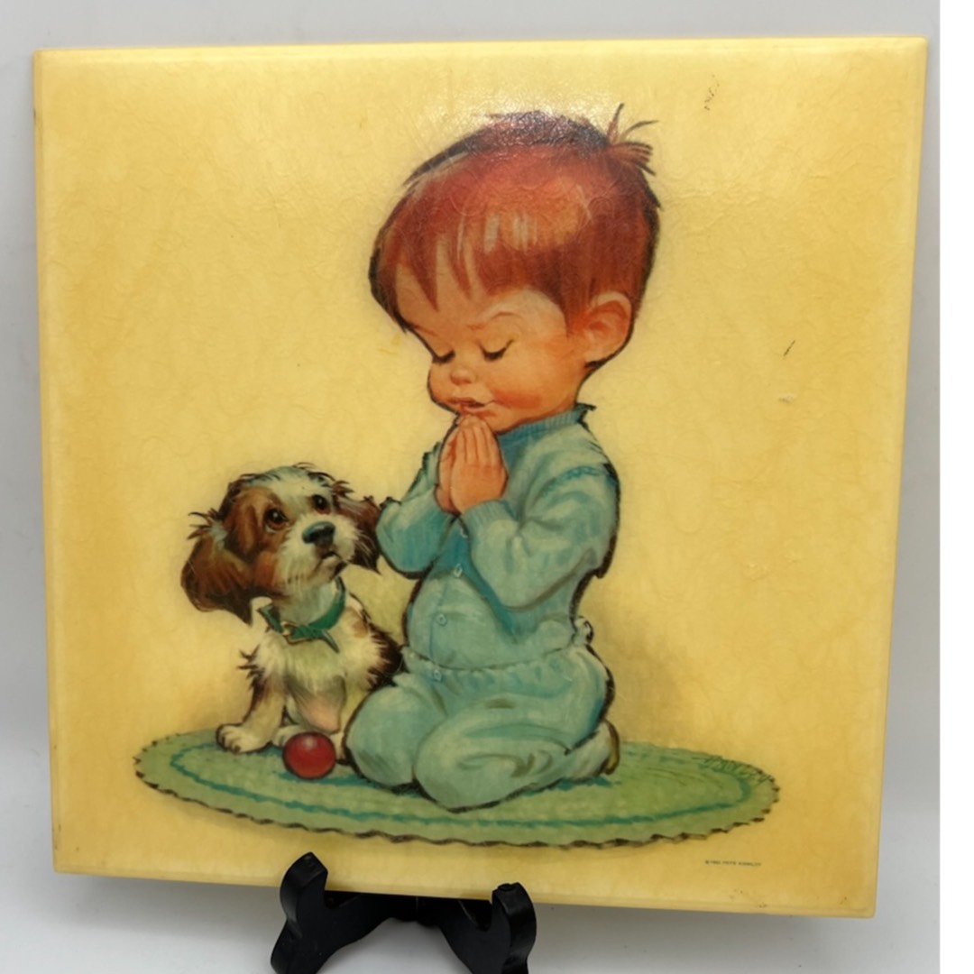 SWEET LITTLE BOY PRAYING WITH DOG