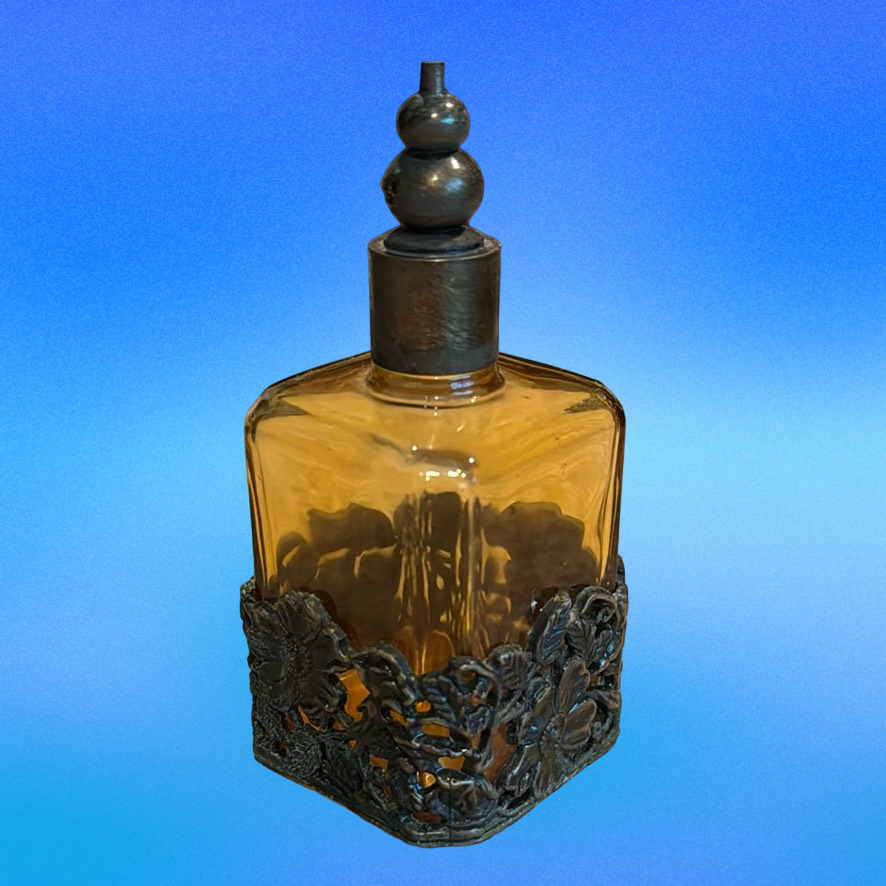 Vintage Amber Glass in Flower Metal Filigree Casing Vanity Perfume Bottle