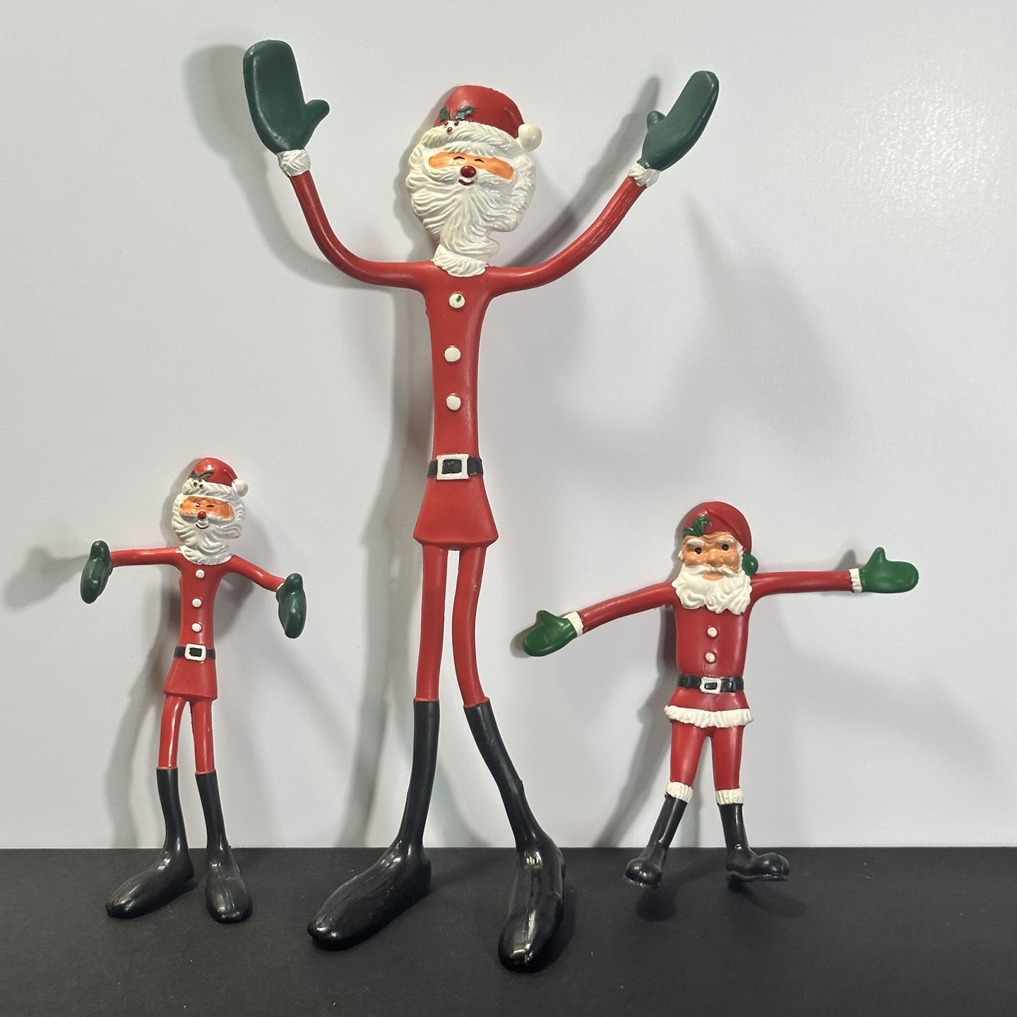 AK239 Vintage Rubber Bendy Red Santa Claus Lot Of Three