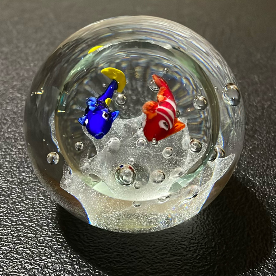 Small Paperweight With Blue And Red Fish.