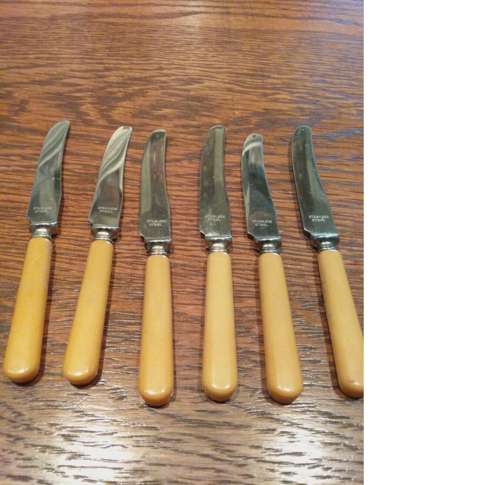 6 Vintage Bakelite handled cocktail knives